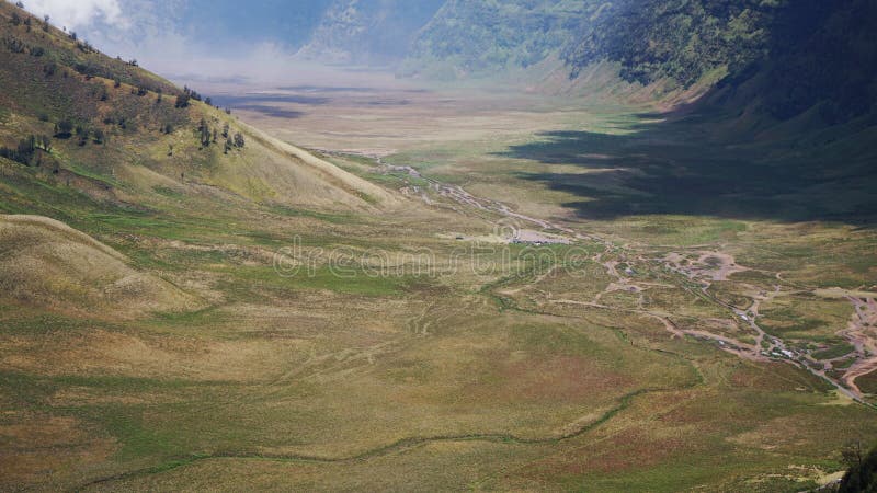 The Vast Valley Around Mount Bromo during the Dry Season Stock Image ...