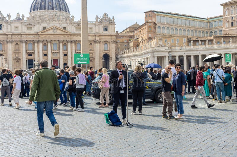 Vatican - April, 23, 2025: TV Journalist Stands Near Crowd and Security ...