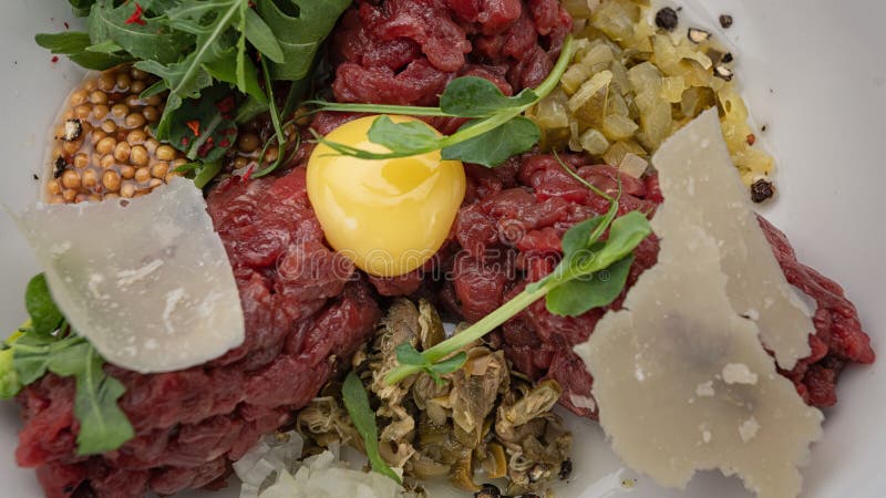 Veal Tar Tar with Egg, Cheese and Herbs Stock Image - Image of plate ...