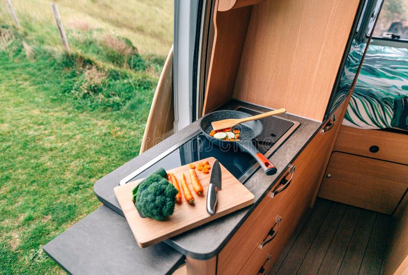 Vegan Meal Preparation in a Campervan Stock Photo - Image of ...