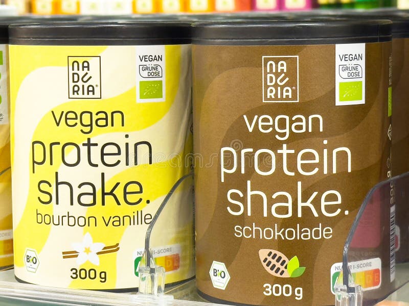 Vegan Protein Shake Containers on Display with Vanilla and Chocolate ...