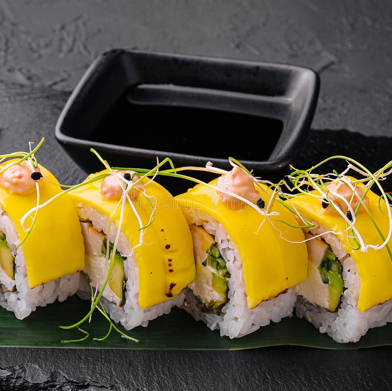 Vegan Yellow Maki Sushi Rolls on Stone Stock Photo - Image of stone ...