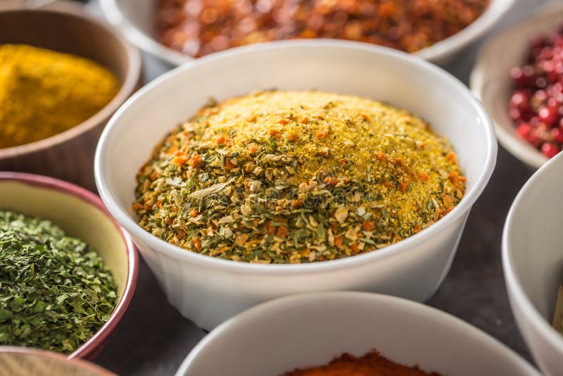 Vegeta and Variety Spices and Herbs in Bowls. Dry Vegetable with Salt ...