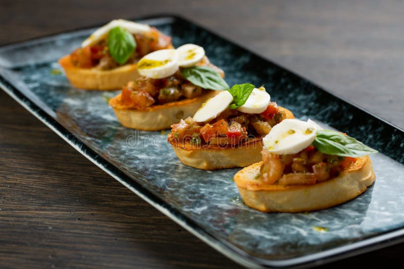 Vegetable Bruschetta with Egg and Cheese on White Toasted Bread ...