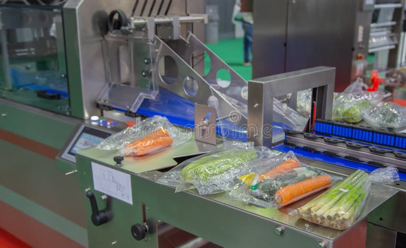 Vegetable Flow Wrapping Machine Stock Image - Image of packaging ...