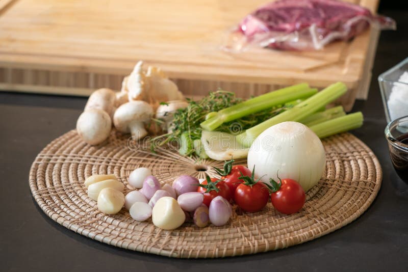 The Vegetable Ingredient on the Circle Wicker Plate on Black Granite ...