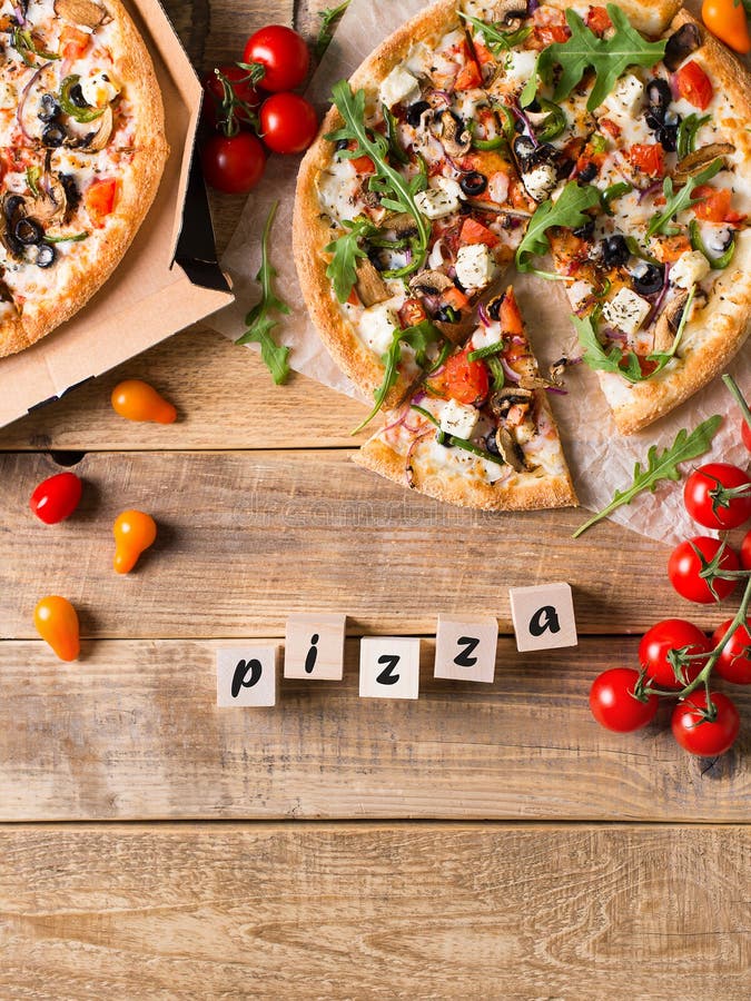 Vegetable Italian Pizza with Tomatos on Wodeen Background Stock Image ...