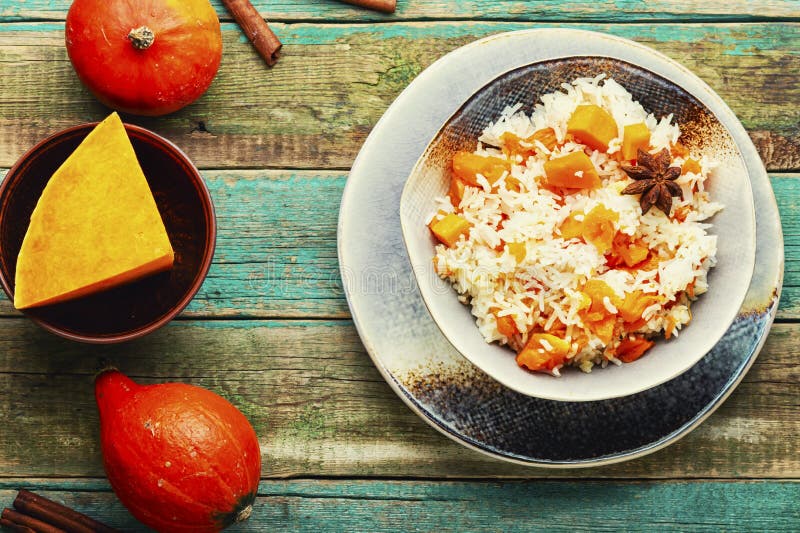 Stewed rice with pumpkin stock photo. Image of season - 240934322