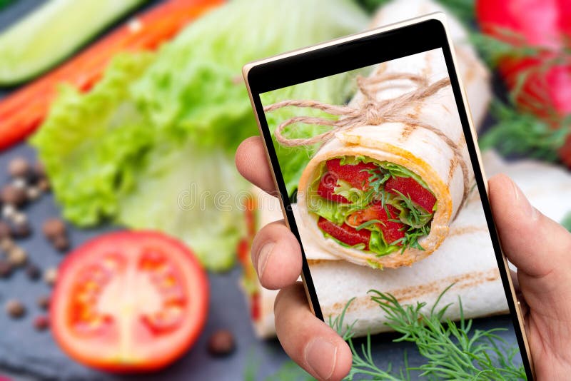 Vegetable Roll on Smartphone Screen. Stock Image - Image of burrito ...