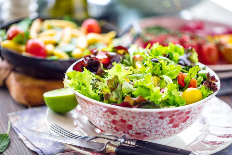 Vegetable Salad Bowl on Kitchen Table. Balanced Diet. Stock Photo ...