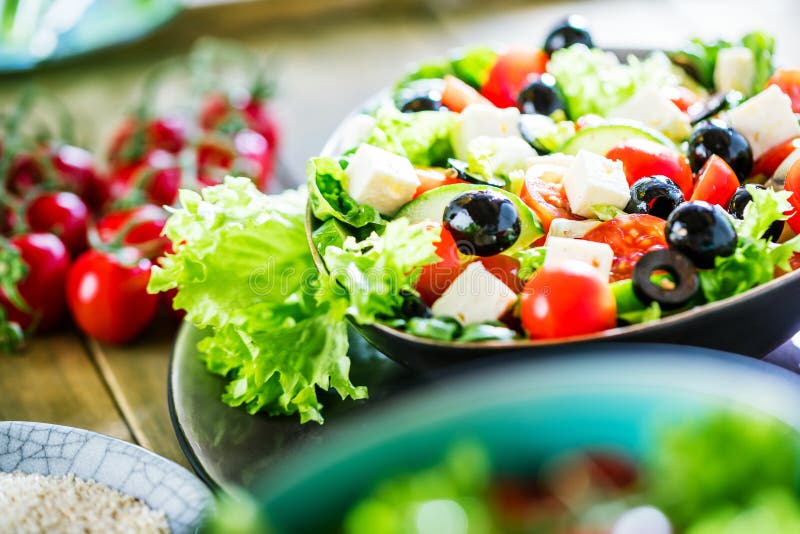 Vegetable Salad Bowl on Kitchen Table. Balanced Diet Stock Photo ...