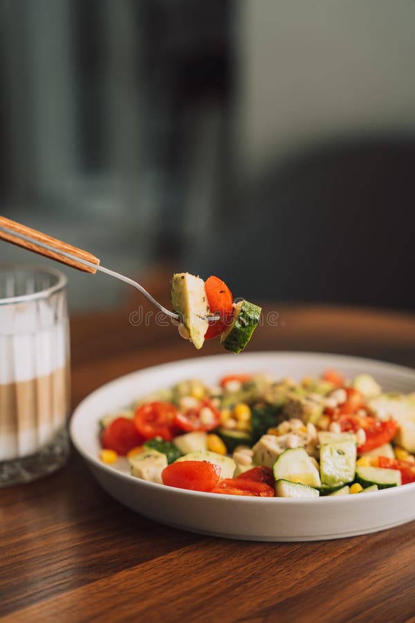 Vegetable Salad with Nuts on a White Plate with a Cup of Coffee Stock ...