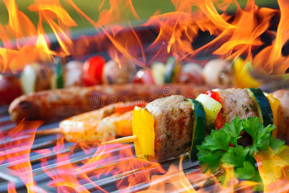 Barbecue with Flames and Vegetable Spit Stock Photo - Image of picnic ...