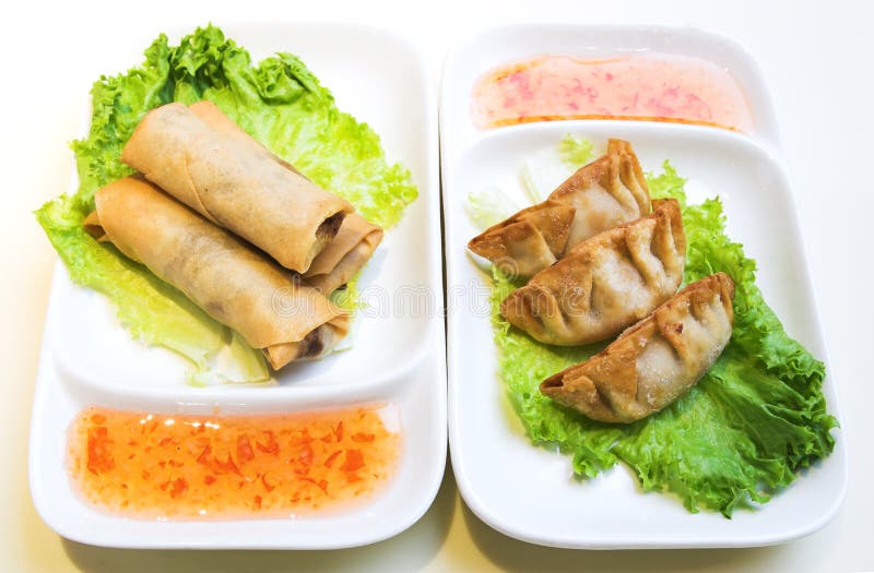 Vegetable Spring Rolls and Chicken Dumplings Stock Image - Image of ...
