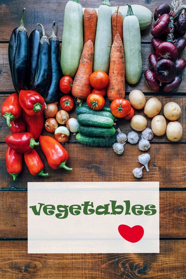 Vegetables of Different Colors on a Dark Textured Background with an ...
