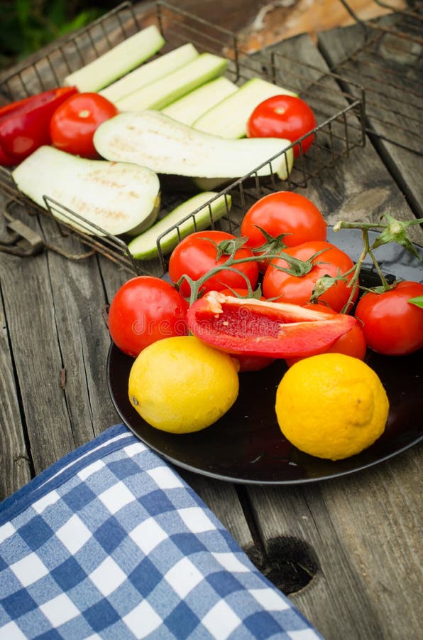 Vegetables and Dishes on Rustic Wooden Table Stock Image - Image of ...