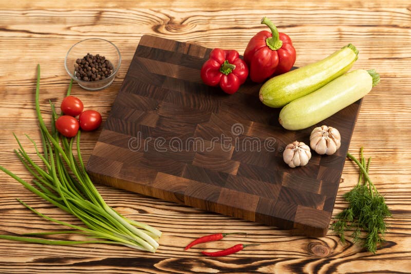 Vegetables and Greens on Wooden Cutting Board Stock Image - Image of ...