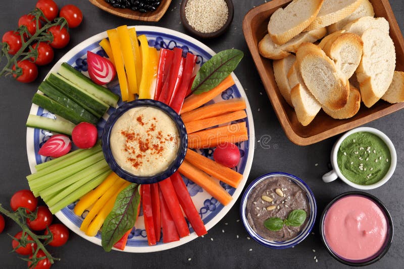 Vegetables and humus stock image. Image of vegetarian - 139480839