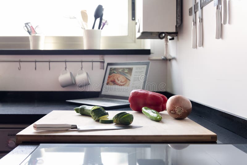 Vegetables, Knife and Computer in a Kitchen Stock Image - Image of ...