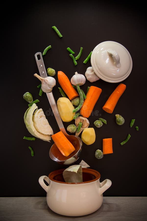 Vegetables in Motion before Cooking in Soup Stock Photo - Image of ...