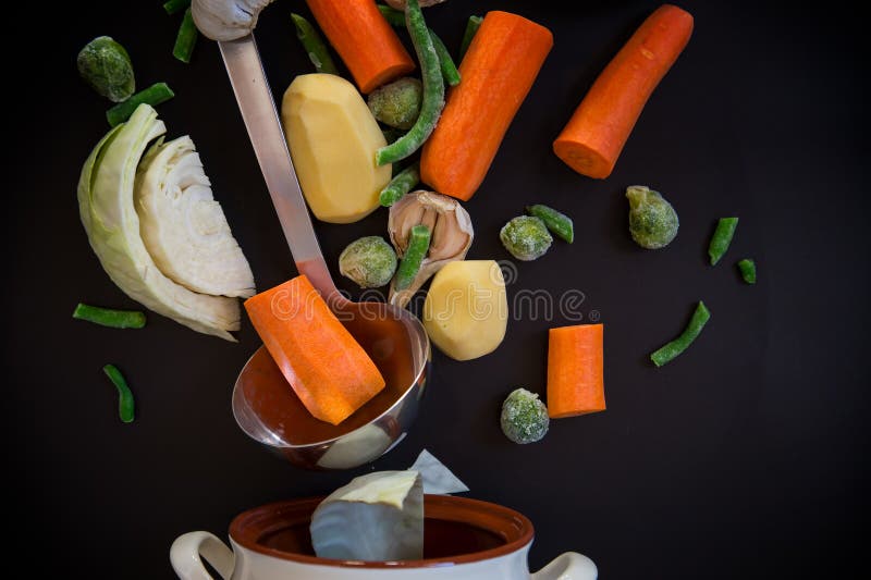 Vegetables in Motion before Cooking in Soup Stock Image - Image of ...