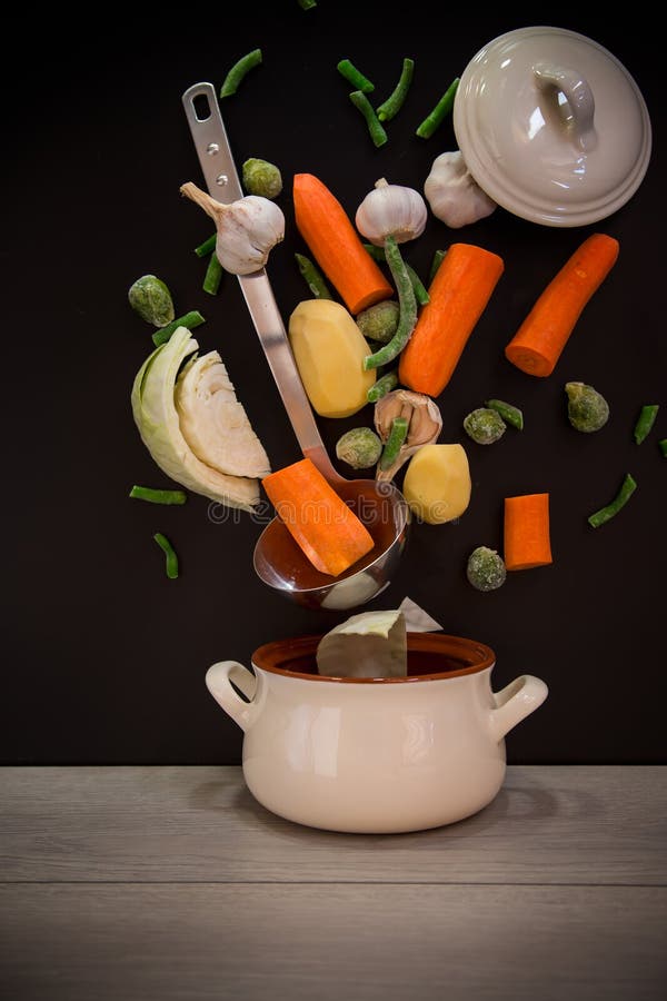 Vegetables in Motion before Cooking in Soup Stock Photo - Image of ...