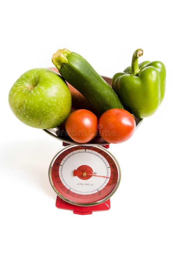 Vegetables on scale stock photo. Image of vegetables, weigh - 9533436