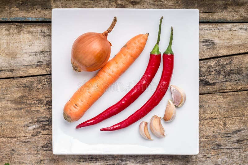 Vegetables on White Square Dish. Cooking Ingredients Stock Photo ...