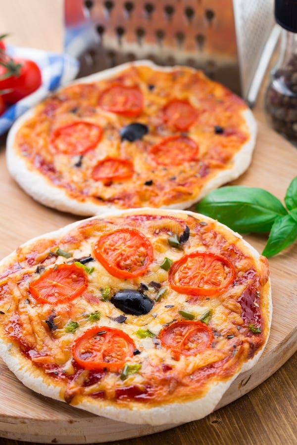 Vegetarian mini pizza stock image. Image of veggie, table - 40678829