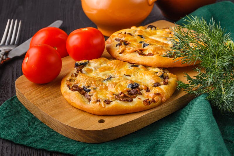 Vegetarian mini pizza stock photo. Image of mini, olive - 144338316