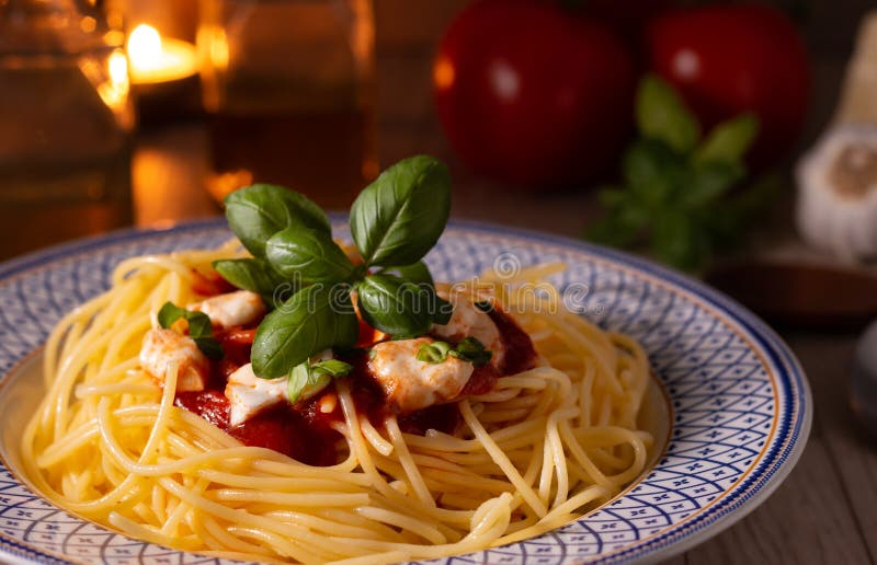 Spaghetti with Mozzarella and Tomato Sauce Stock Photo - Image of food ...