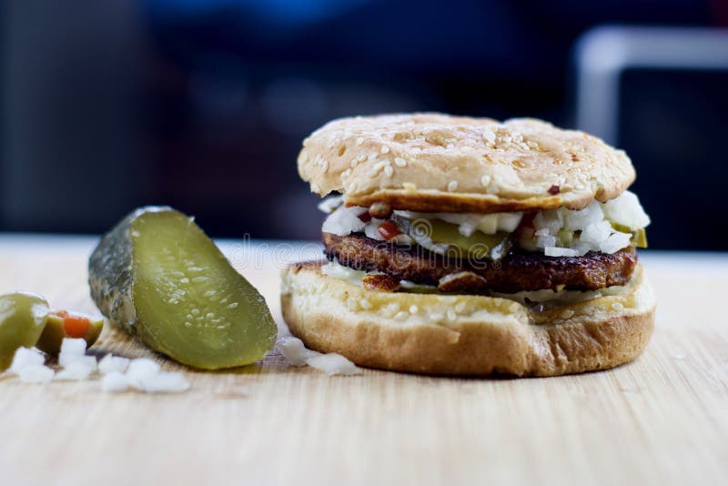 Veggie burger on desk stock photo. Image of olives, onion - 92565126