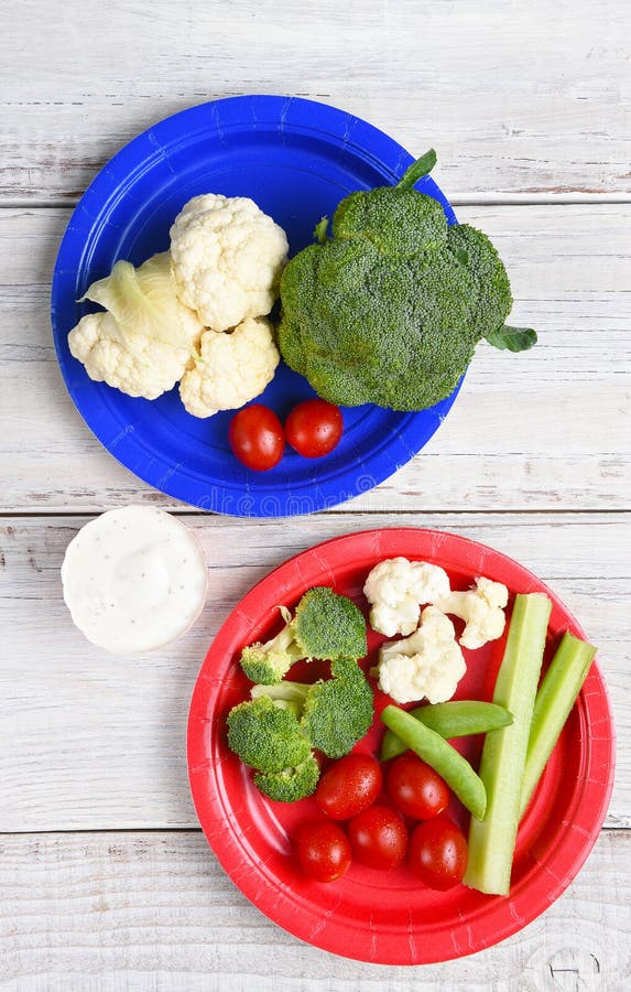 Veggies on Paper Plates stock photo. Image of snap, rustic - 76629880
