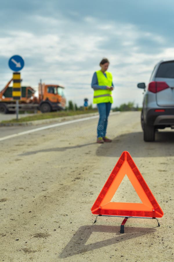 Vehicle Breakdown and Warning Triangle on the Road Stock Image - Image ...