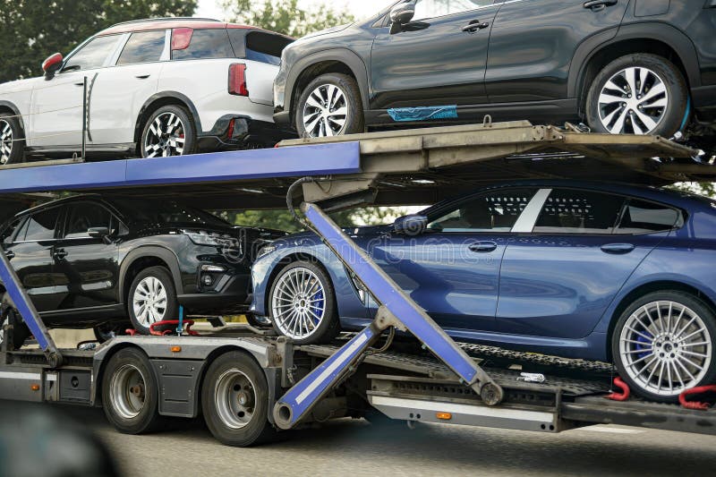 A Vehicle with Cars for Transporting Cars on a Motorway Stock Photo ...