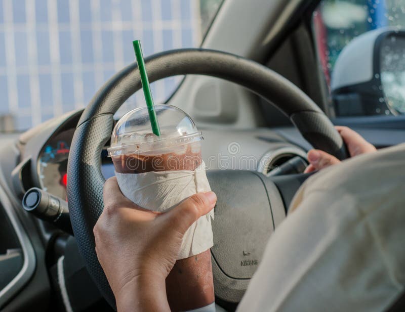 Vehicle Concept - Man Drinking Coffee while Driving the Car Stock Image ...