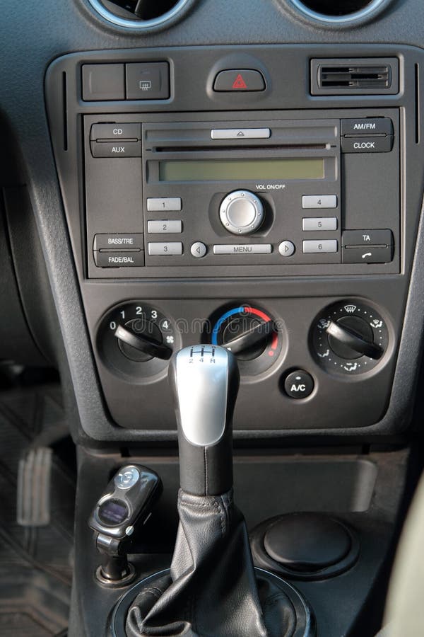 Car stereo CD and FM radio stock image. Image of inside - 42443241
