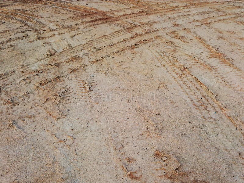 Vehicle Tracks in the Sand. Background of Footprints on the Beach. Dry ...