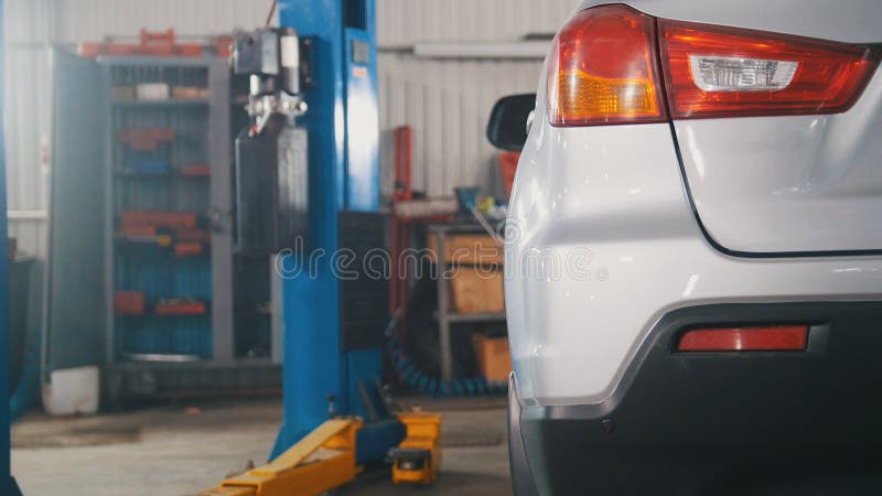 Car Service Station - Auto Standing in Garage, Sunny Midday Stock Image ...