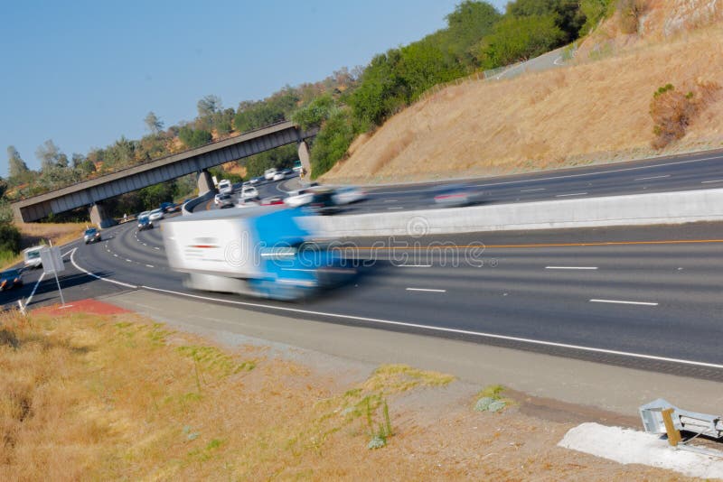 Vehicles in Motion on Three Lane Highway Stock Image - Image of blue ...