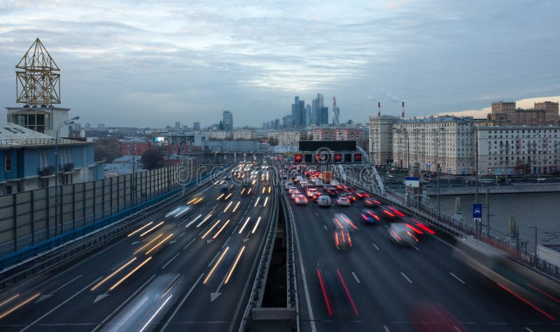 Vehicular traffic at night stock photo. Image of city - 131429088