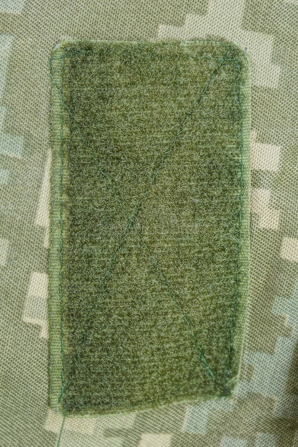 Velcro Verde Na Roupa Militar Manchada Foto de Stock - Imagem de emenda ...