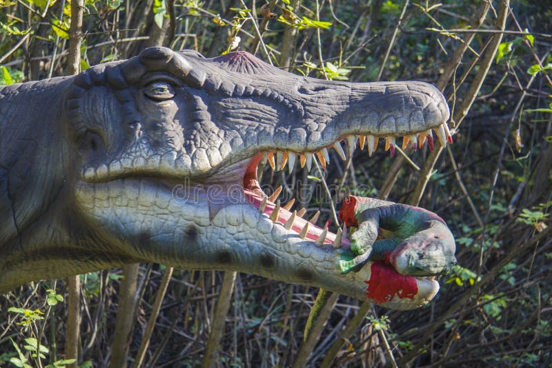 Velociraptor with prey stock image. Image of fang, hunter - 45412311