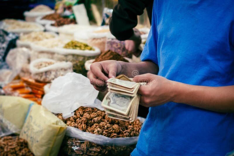 Vendor Counting Mony on Market Stock Photo - Image of hands, holding ...