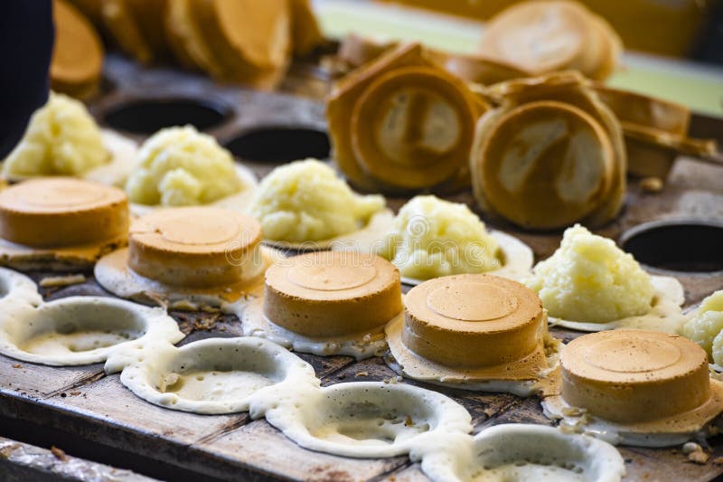 The Birth of Wheel Cakes stock photo. Image of freshly - 369385970