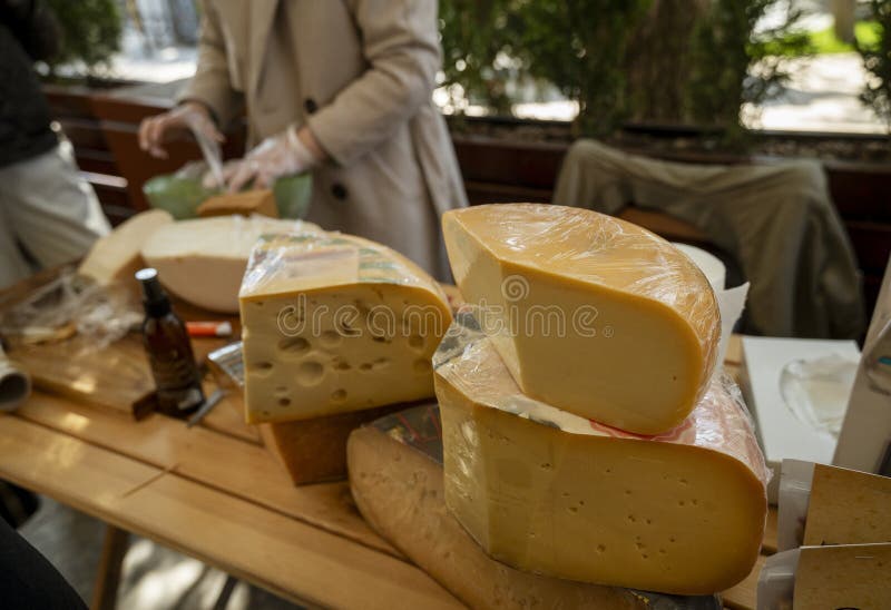 A Vendor Sells Different Types of Cheese at a Street Fair Stock Image ...