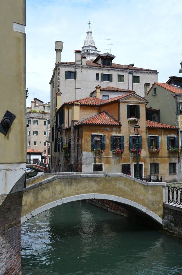 Venetian bridge over canal stock photo. Image of bridge - 57027970