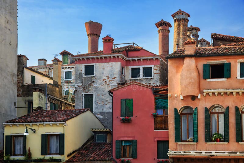 Venetian Rooftops and Chimneys Stock Image - Image of wall, shutters ...