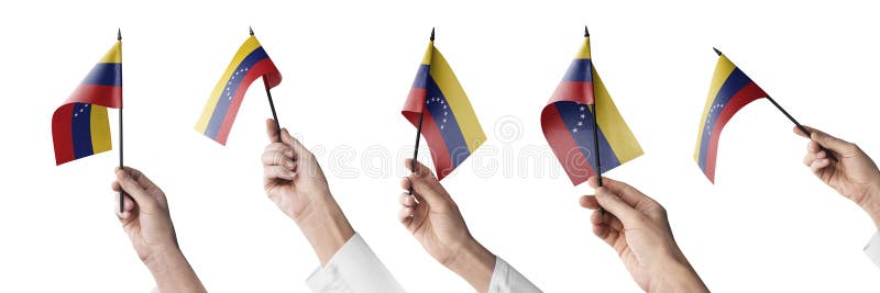 The Venezuela Flag in Hand in Different Angles on a White Background ...