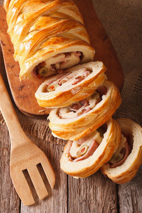 Venezuelan Bread Pan De Jamon Close-up on the Table. Vertical Stock ...